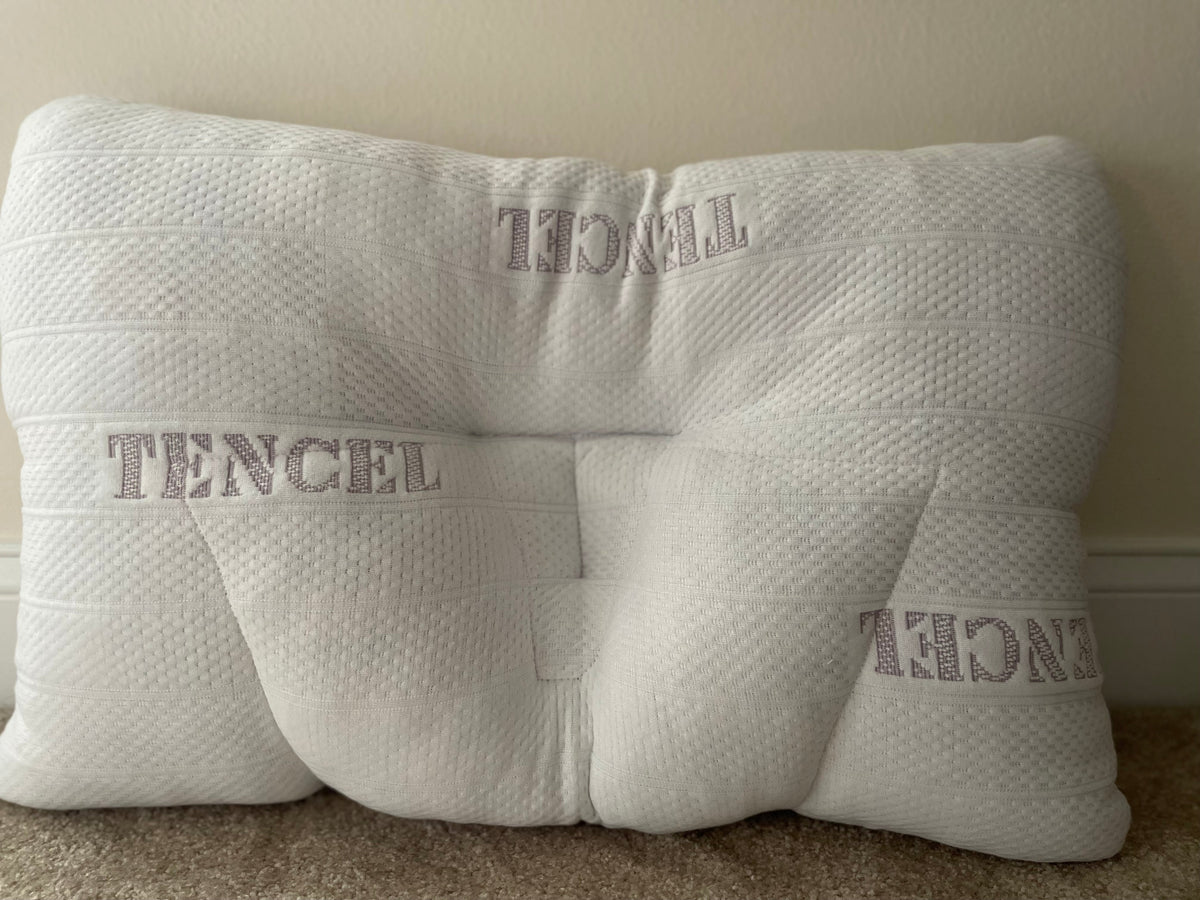 Discover the Small Arc4life Adjustable Traction Pillow: Big Relief in